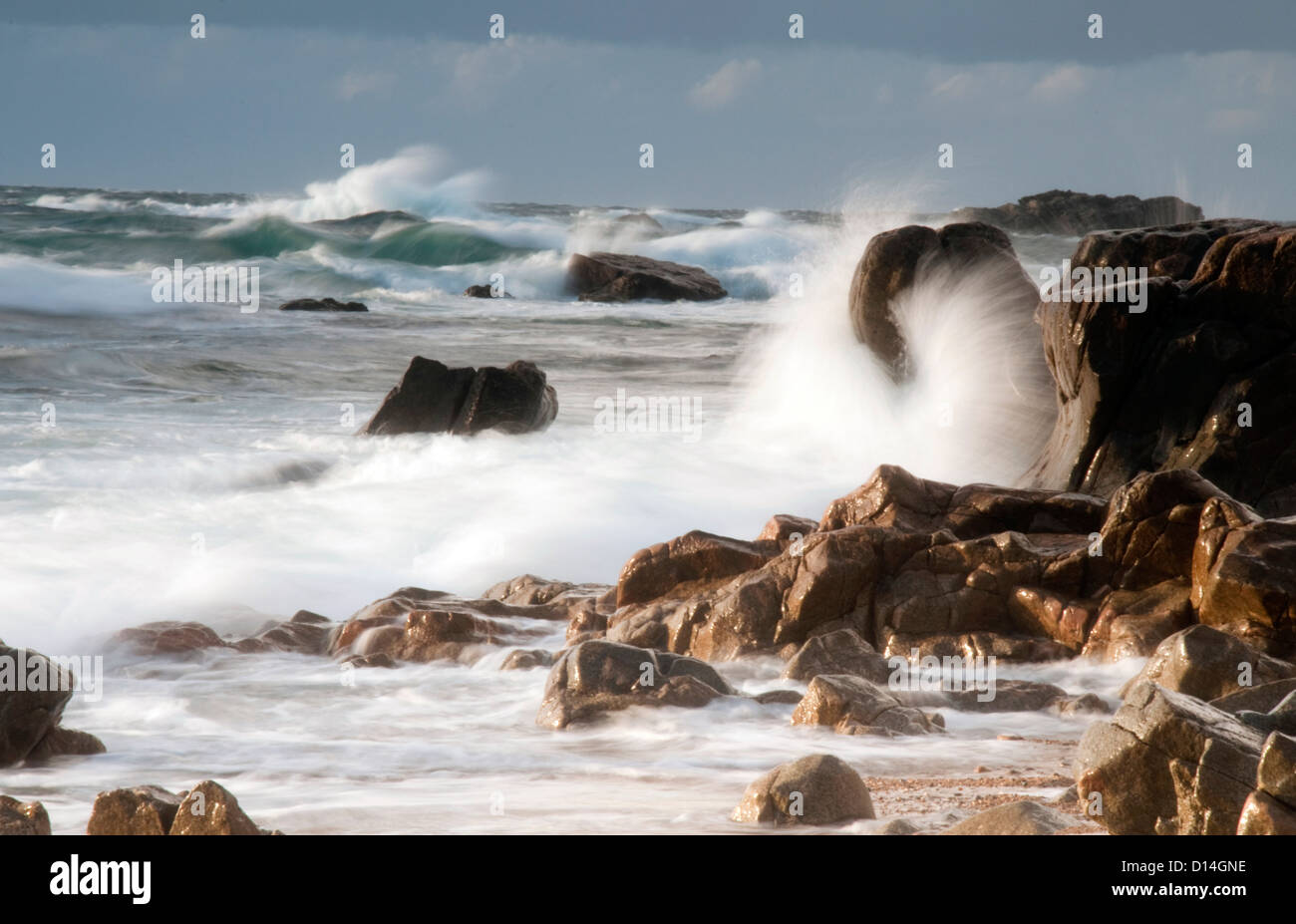 Waves on the beach at Clonque Bay on Alderney, Channel Islands Stock ...