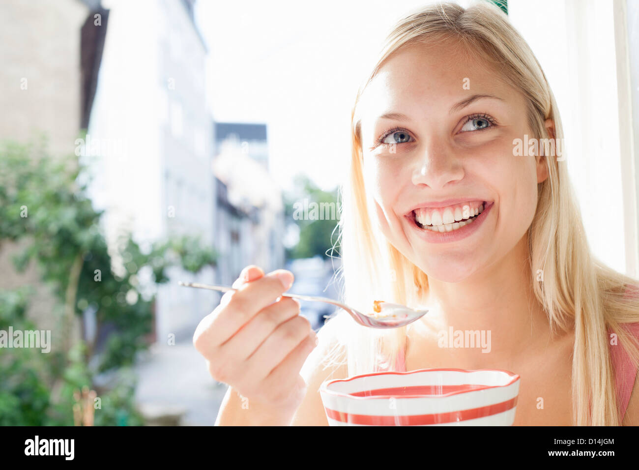 Person smiling women yogurt hi-res stock photography and images - Alamy
