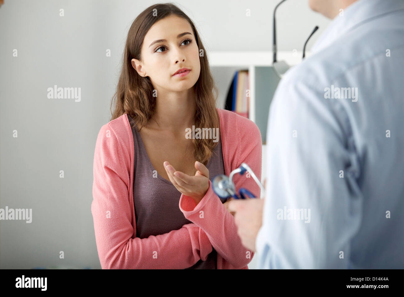 WOMAN IN CONSULTATION, DIALOGUE Stock Photo - Alamy