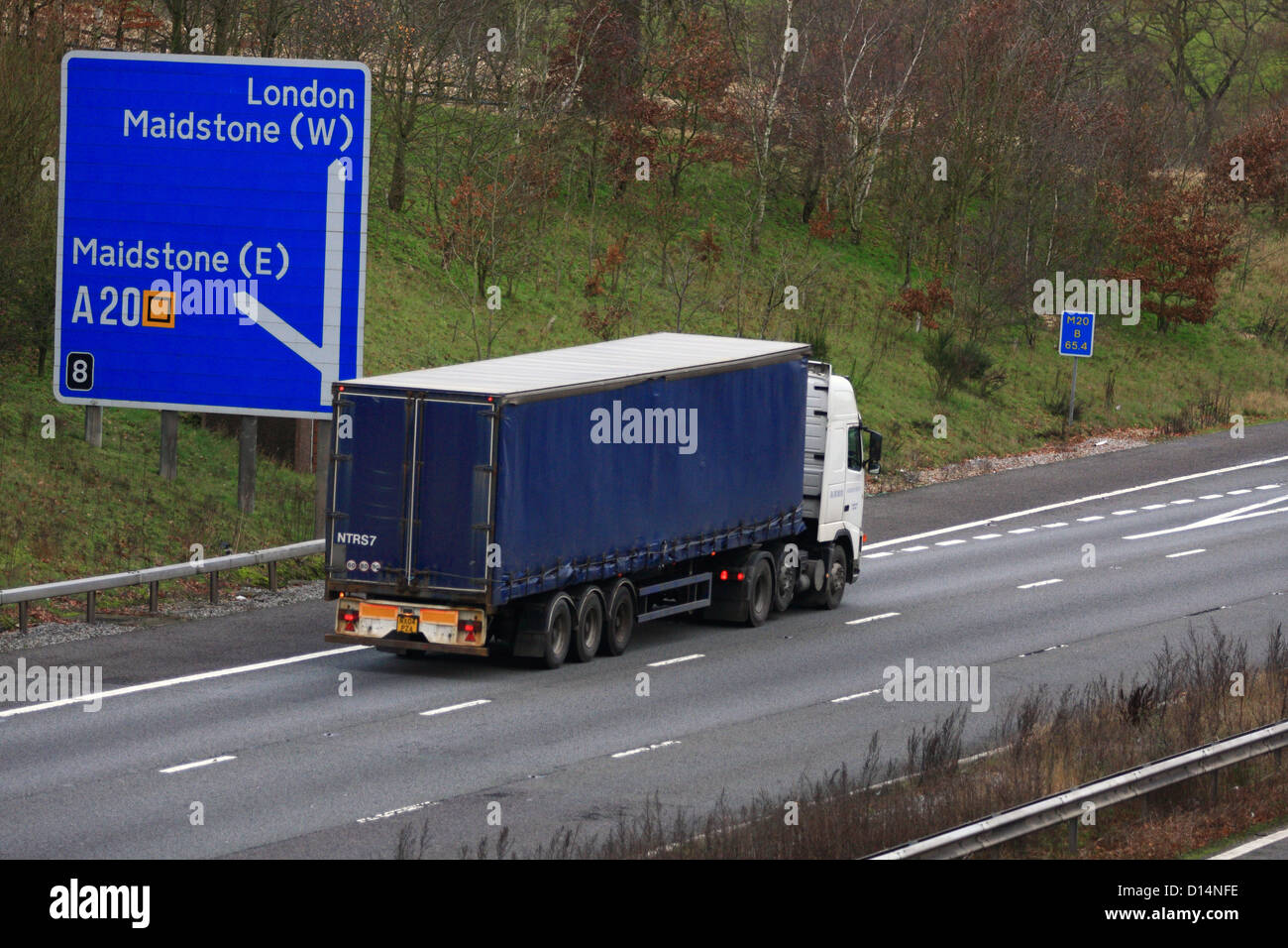 A Truck traveling along the M20 motorway in Kent, England Stock Photo ...
