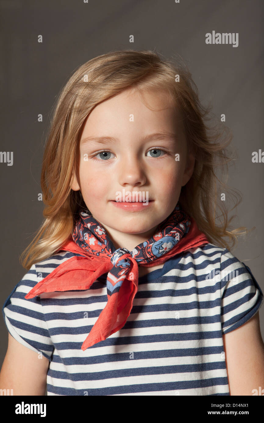 Girl wearing silk scarf in studio Stock Photo - Alamy