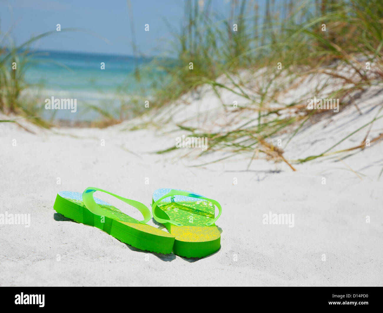 USA, Florida, St. Petersburg, Pair of flip flops on sandy beach Stock ...