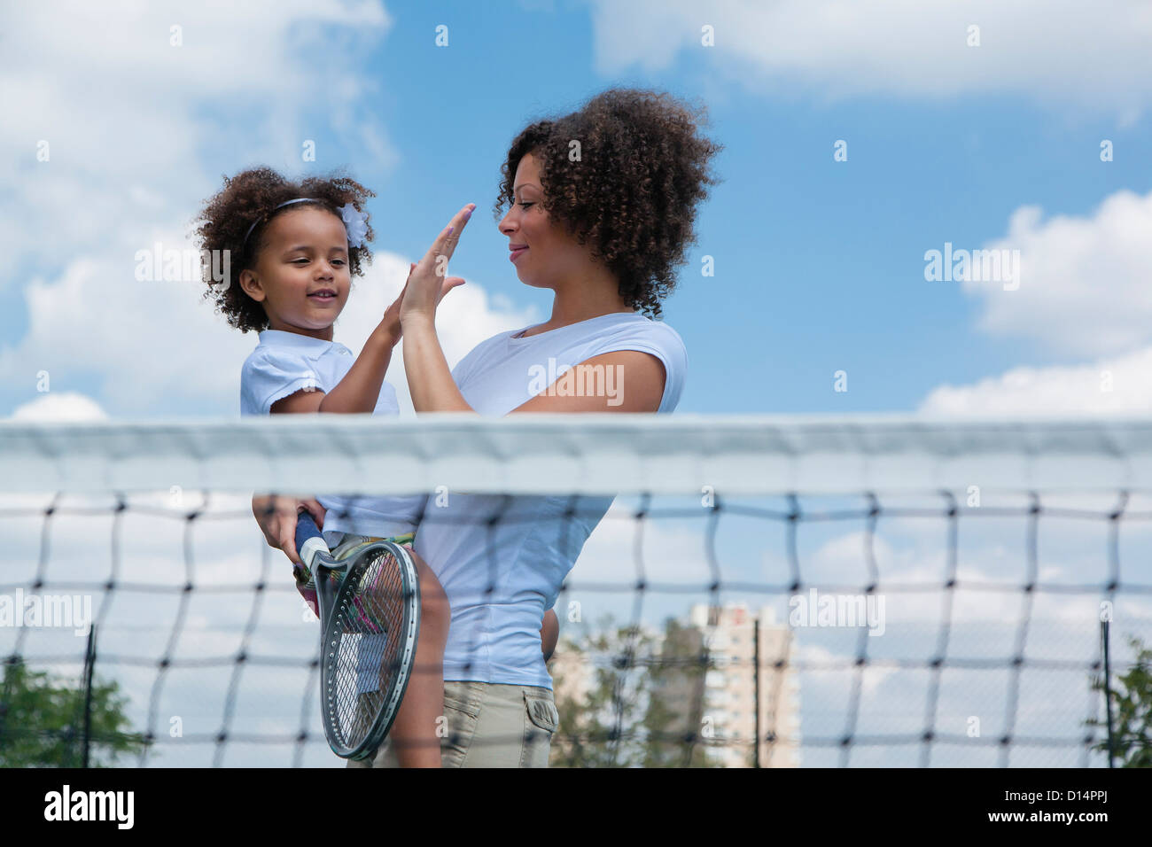 Mom high fiving child hi-res stock photography and images - Alamy