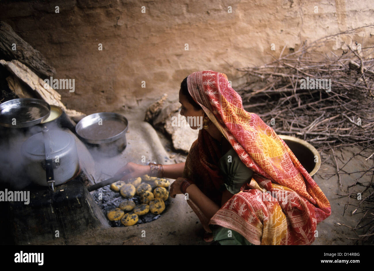 Indian village woman cooking hi-res stock photography and images - Alamy