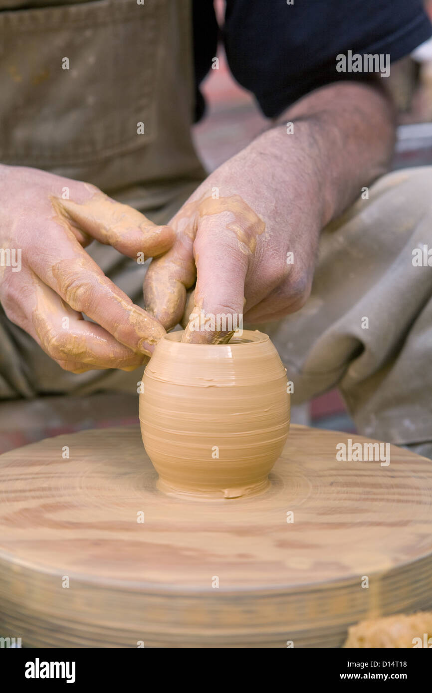 Potters making a cup Stock Photo - Alamy