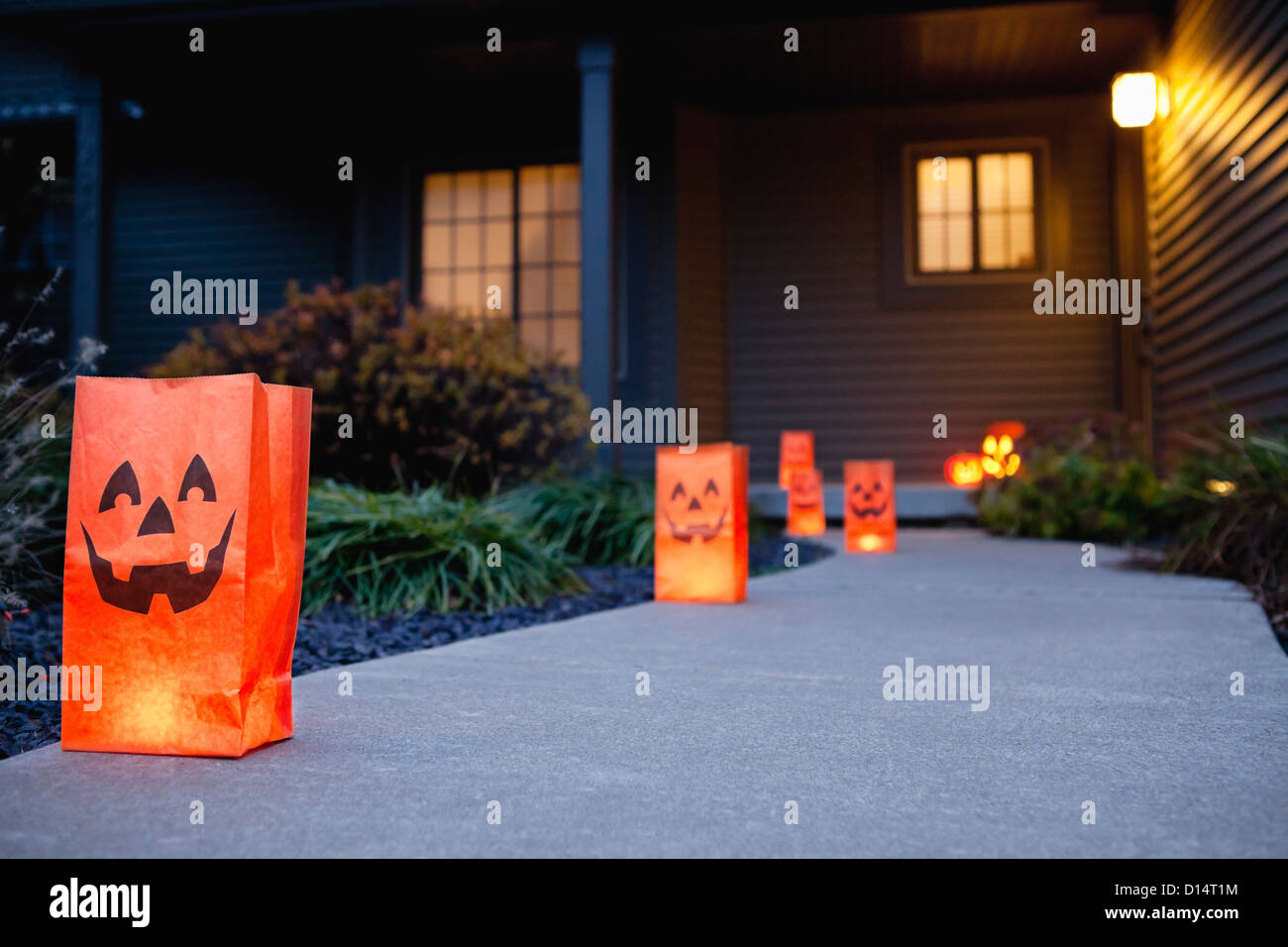 USA, Illinois, Metamora, Footpath in garden decorated for Halloween ...