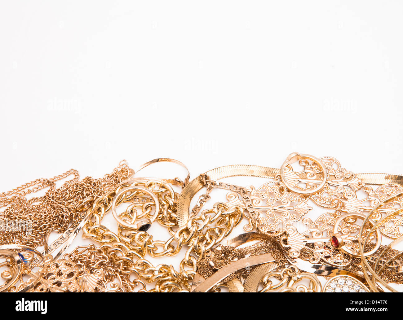 Studio shot of gold jewelry Stock Photo - Alamy