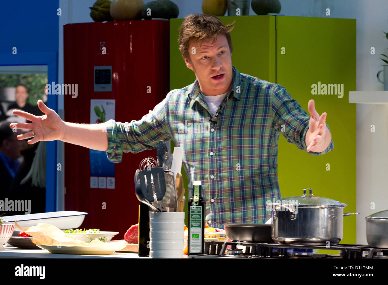 London, UK. 7th December 2012. Jamie Oliver conducts a cooking ...