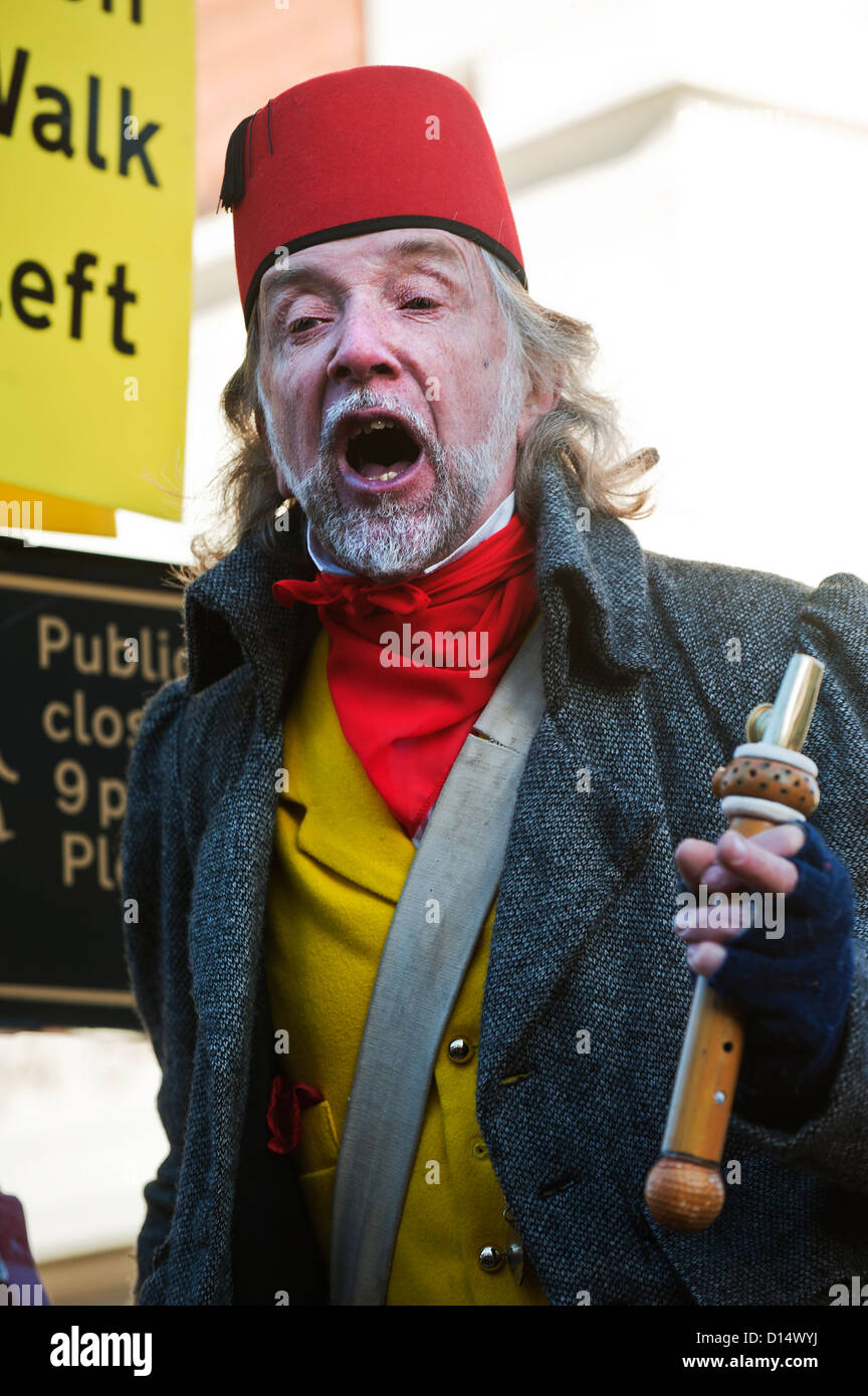 Keith Beckford performing as the Rochester Lamplighter at the Dickens ...