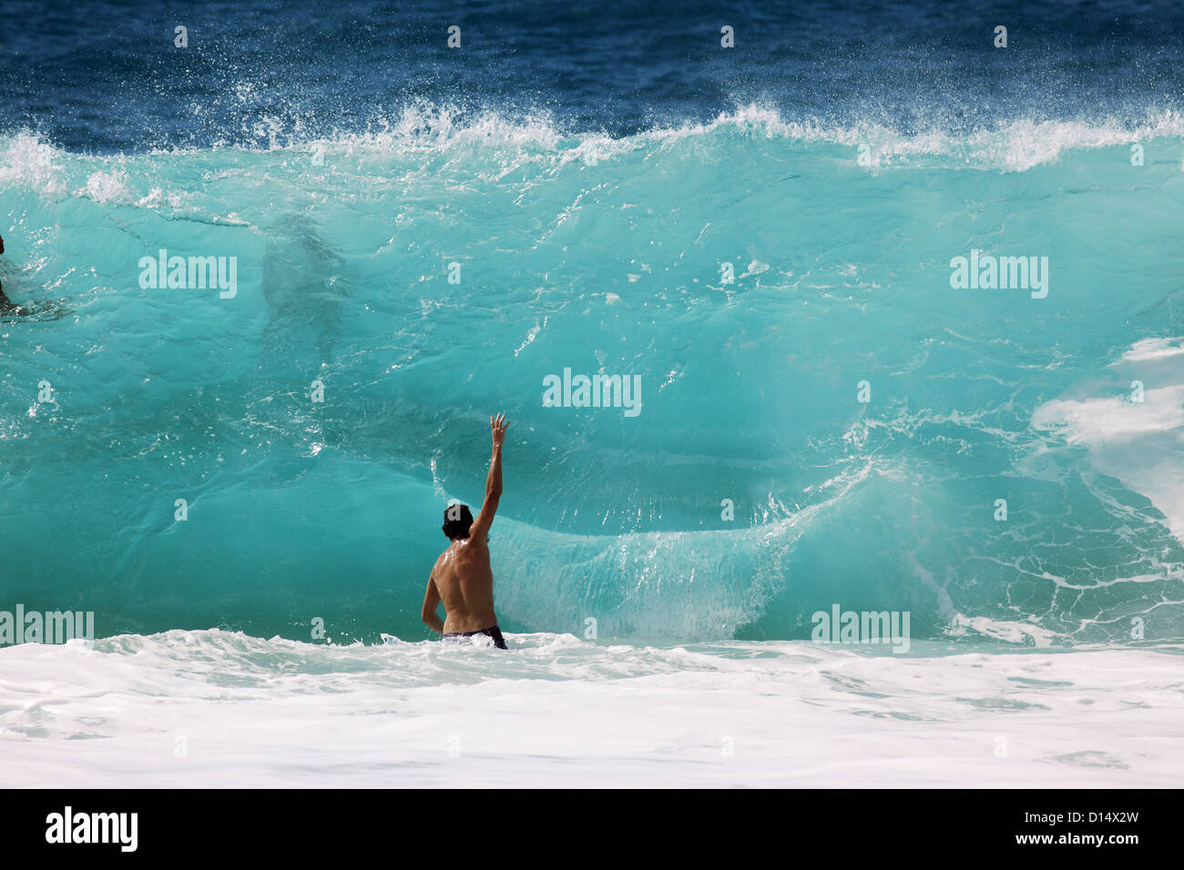 Hawaii, Oahu, North Shore, Man Faces Giant Wave. (Editorial Use Only ...