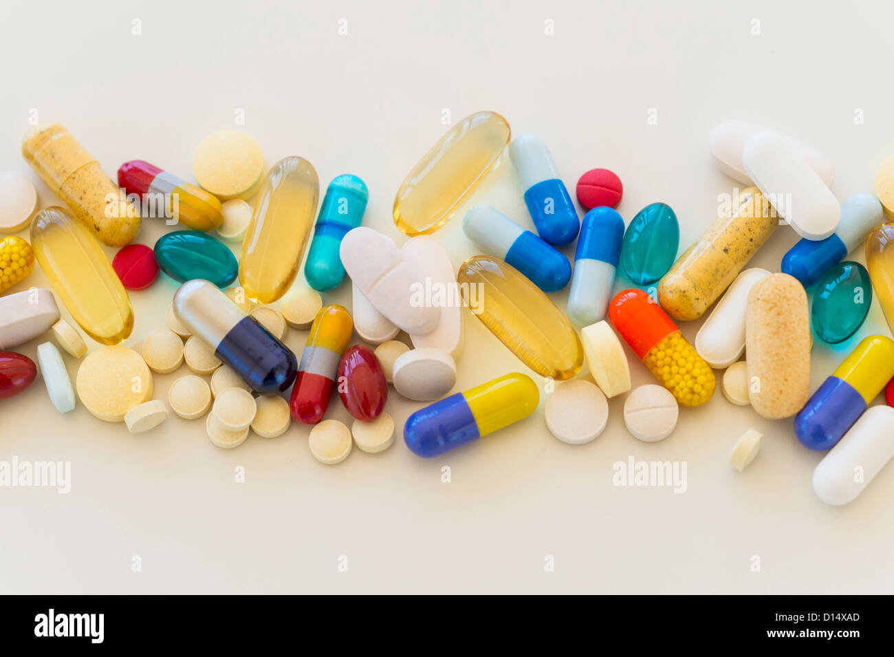 Colorful pills on white background Stock Photo - Alamy