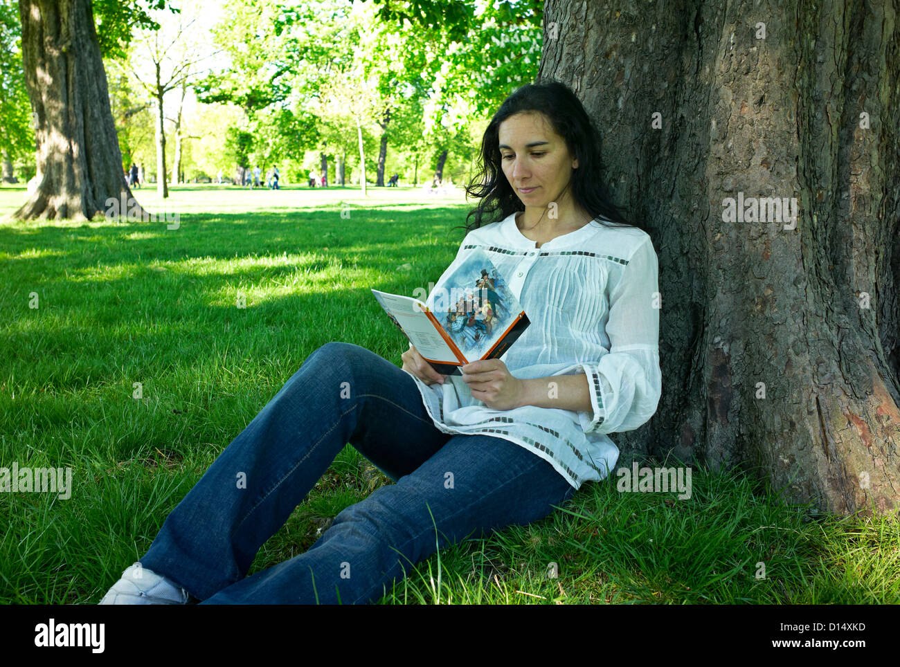 -Model Reading a book- Kengsinton Garden, London (United Kingdom Stock ...