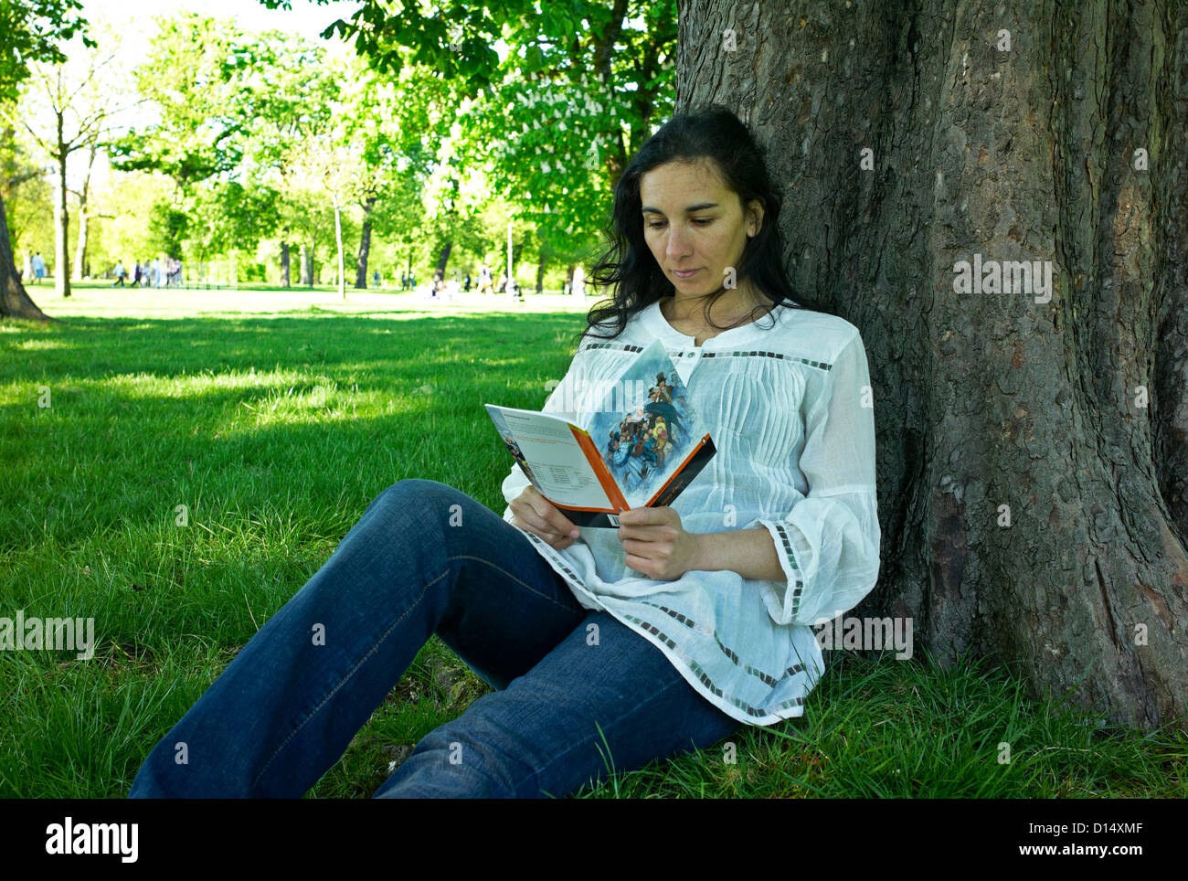 -Model Reading a book- Kengsinton Garden, London (United Kingdom Stock ...