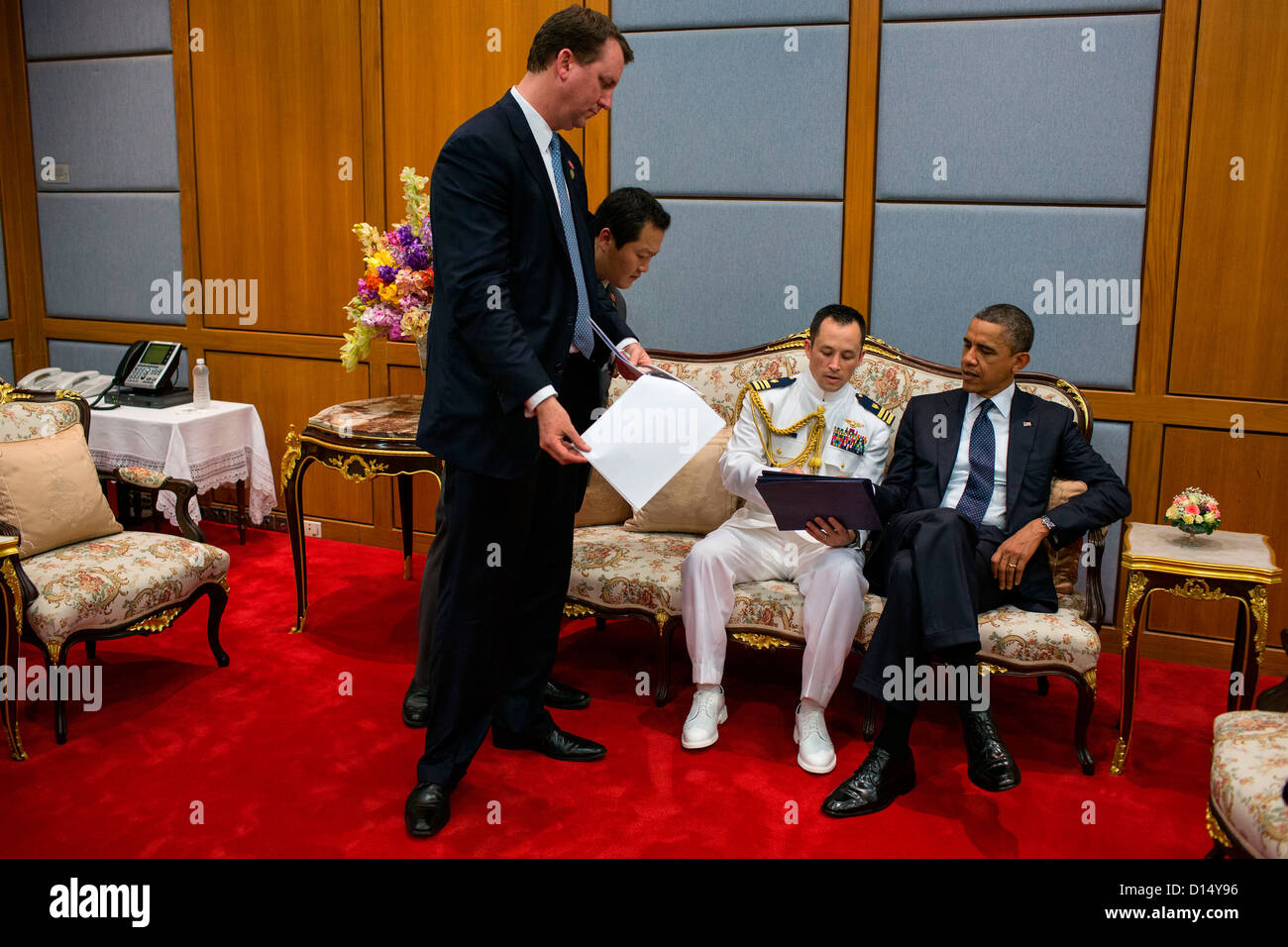 US President Barack Obama is briefed by Trip Director Marvin Nicholson ...