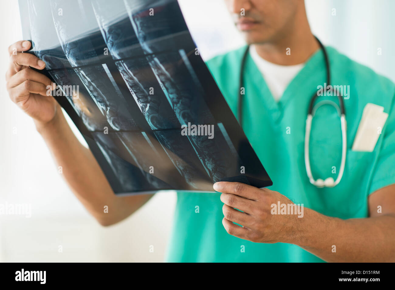 USA, New Jersey, Jersey City, Doctor looking at x-ray image Stock Photo ...