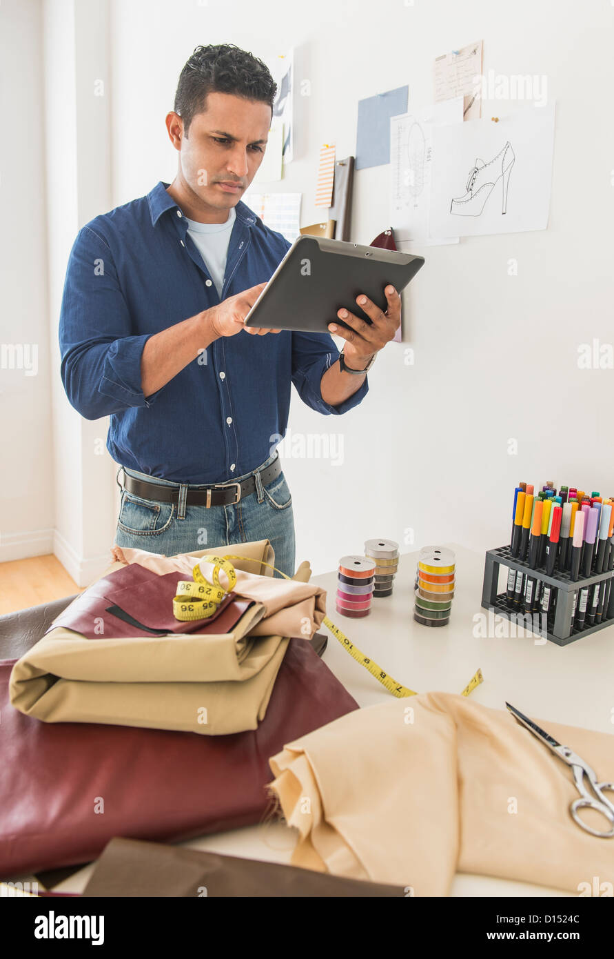 USA, New Jersey, Jersey City, Fashion designer in studio Stock Photo ...