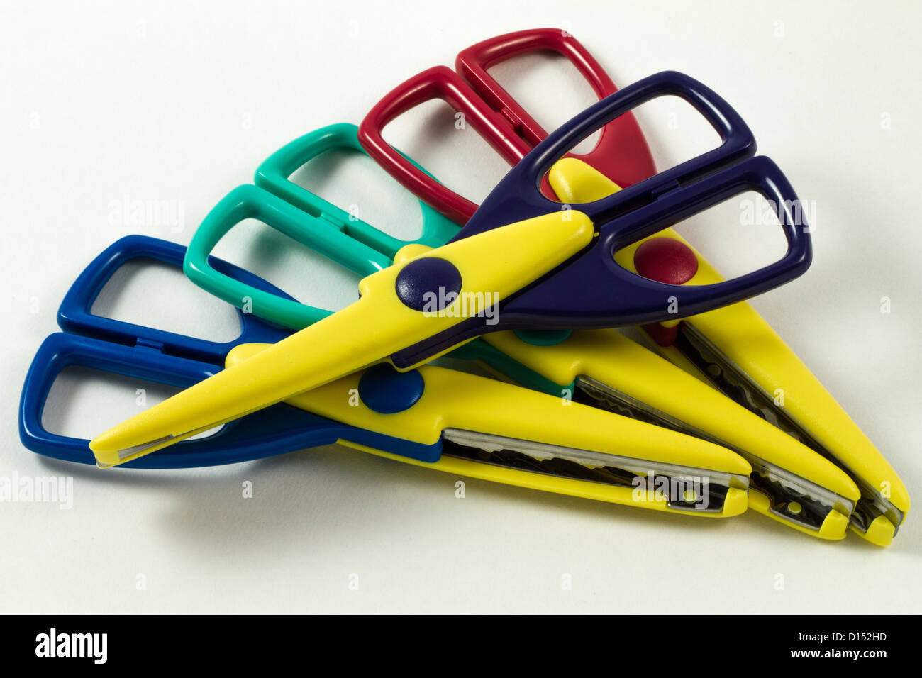 Four Scissors isolated on white background Stock Photo - Alamy