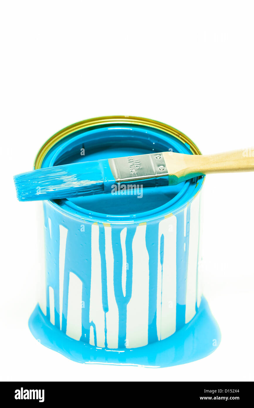 Can with a blue oil paint. Shallow DOF. Isolated on white Stock Photo ...
