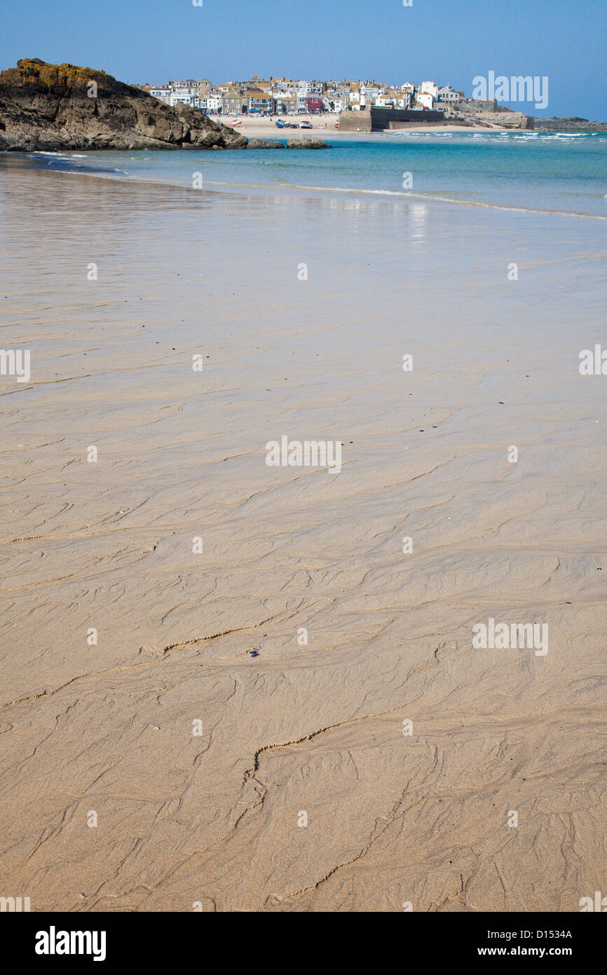Sand patterns on Porthminster Beach and the entrance to St Ives harbour ...