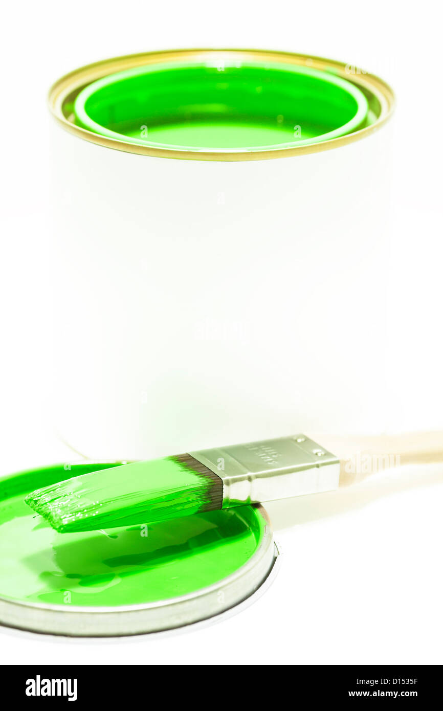 Can of bright green paint and brush. Shallow DOF Stock Photo - Alamy