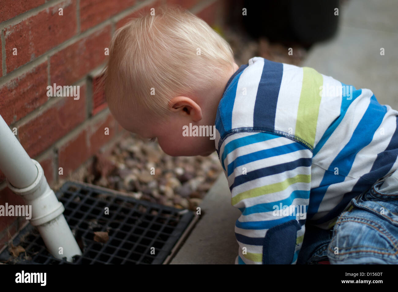 toddler and drain Stock Photo - Alamy