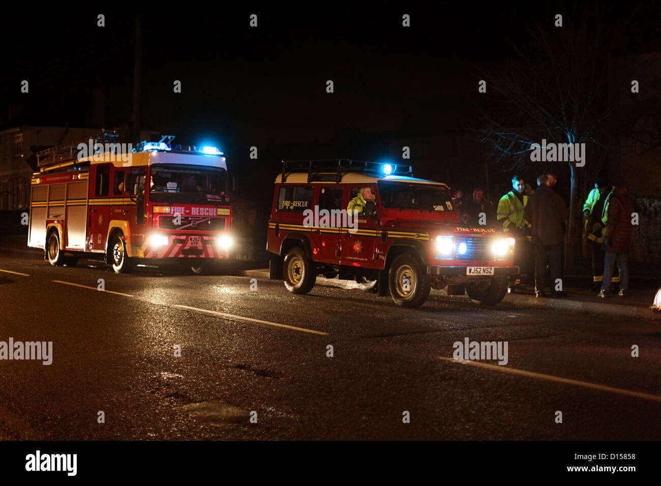 British Fire engine with blue lights, actually in a Christmas parade ...