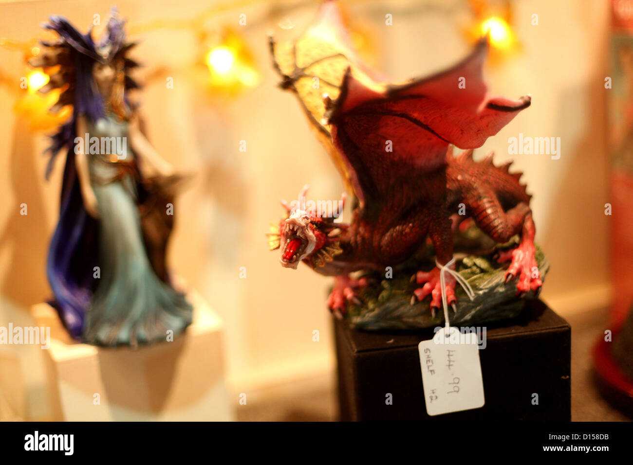 Dragon figures on display in a shop window in Cheddar gorge, December ...