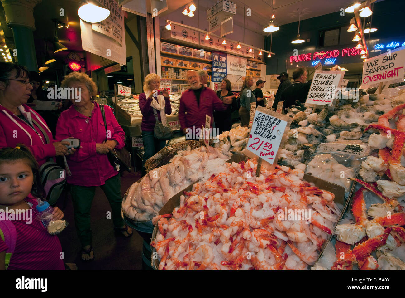 Fishmongers sell seafood at the Pike Place Market in downtown Seattle ...