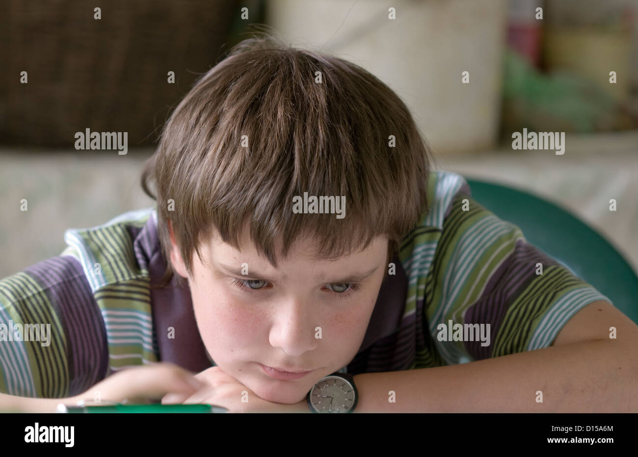 A boy hardly solving homework Stock Photo - Alamy