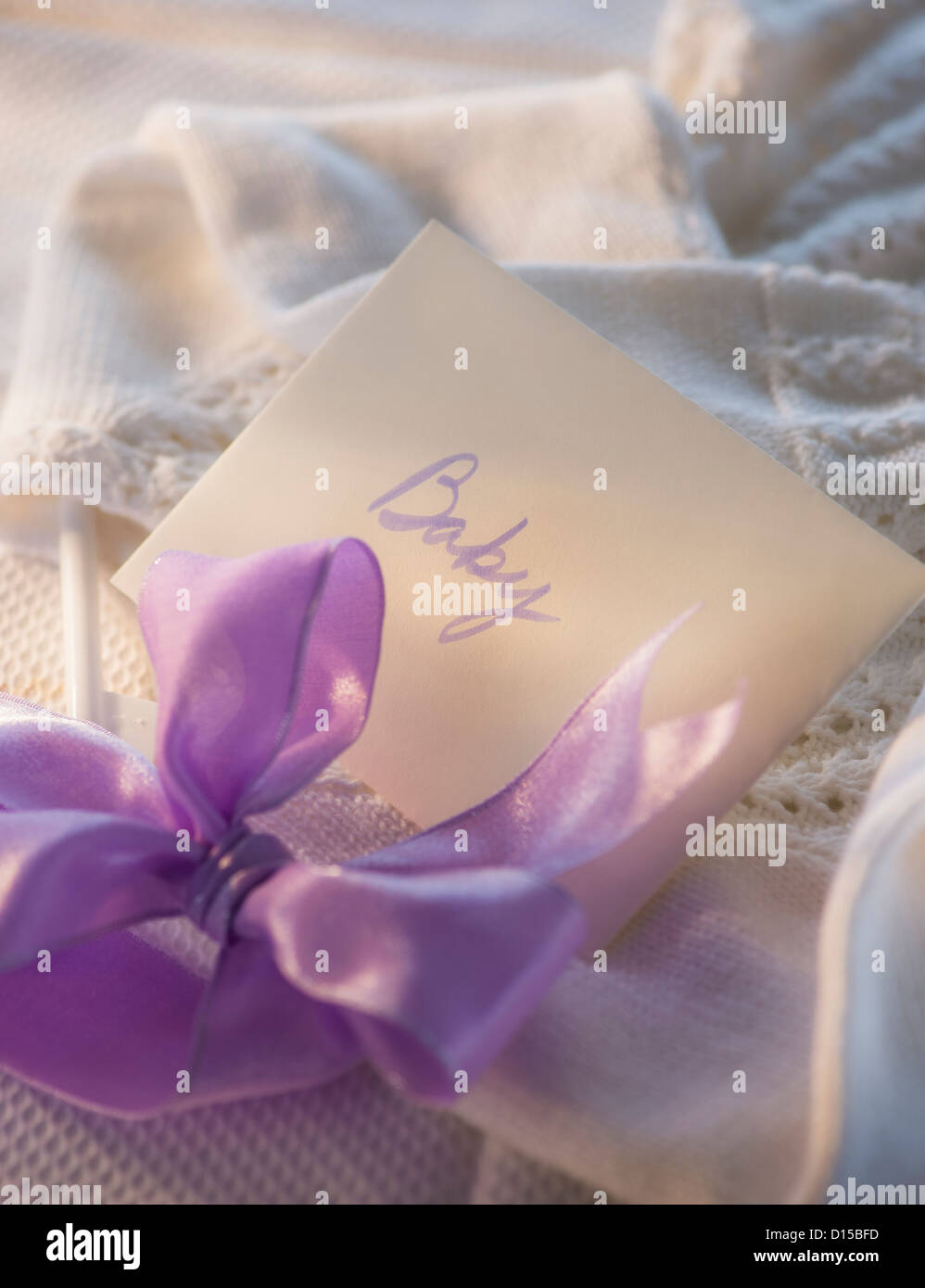 Close-up of envelope and purple bow Stock Photo - Alamy