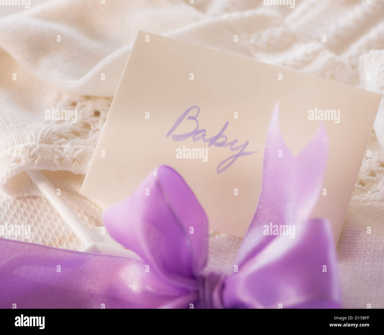 Close-up of envelope and purple bow Stock Photo - Alamy