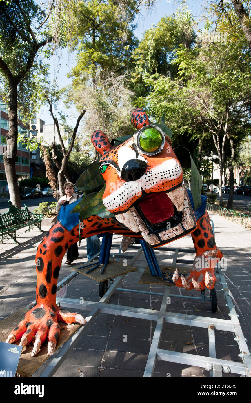fantastic papier mache jaguar demon monster displayed on median park ...
