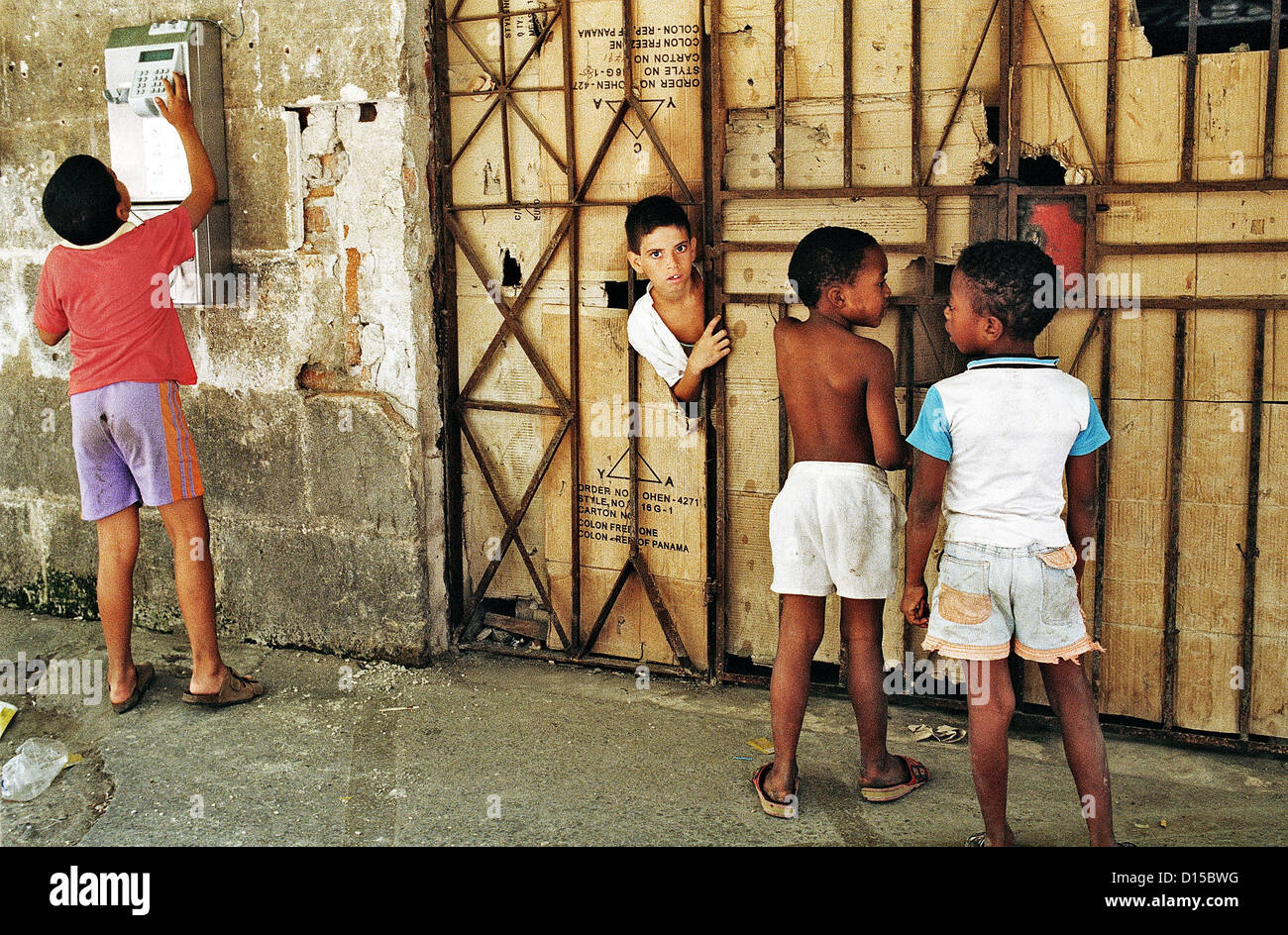 Havana, Cuba, boys in front of the door to a friend Stock Photo - Alamy