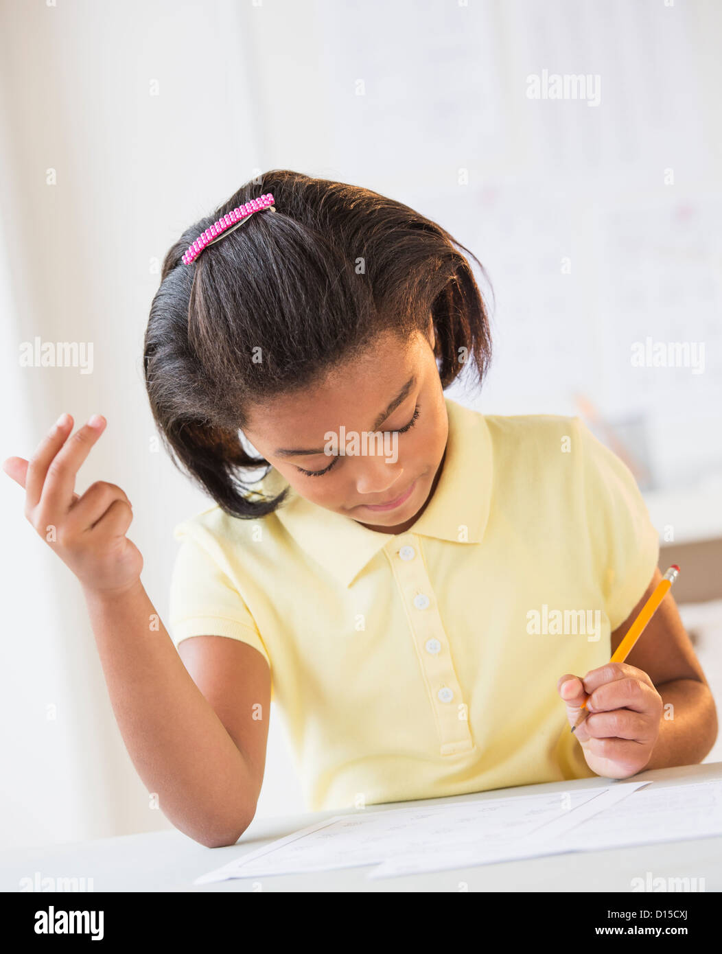 Left handed girl homework hi-res stock photography and images - Alamy