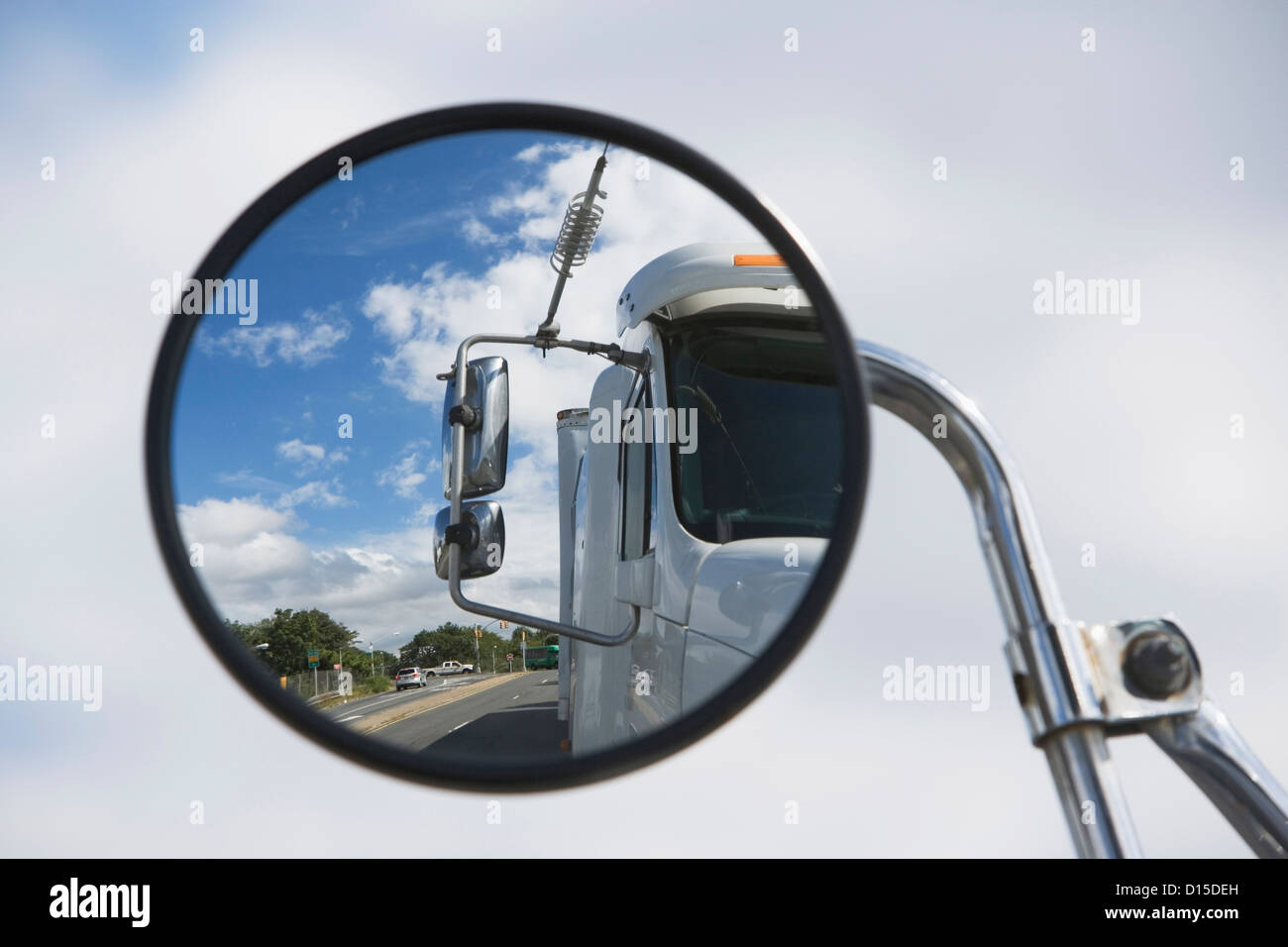 USA, New York State, New York City, Reflection of semi-truck in side ...