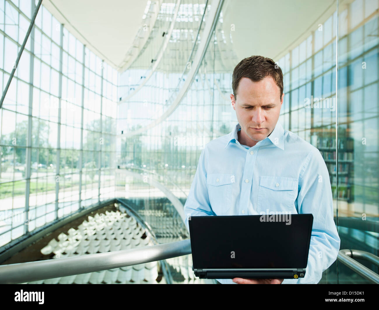USA, Utah, Salt Lake City, Portrait of man using laptop Stock Photo - Alamy