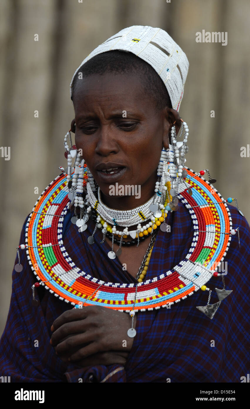 Masai woman with beaded jewelry in a village near Ngorongoro Crater ...