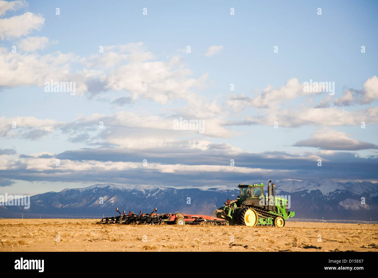 USA, Colorado, Tractor tilling field Stock Photo - Alamy