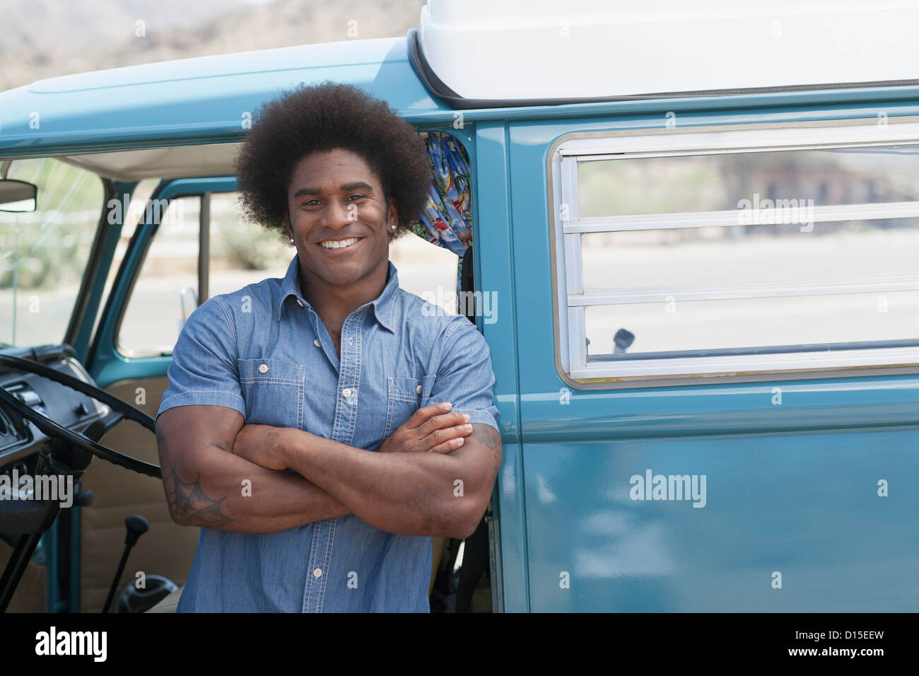 Portrait of man standing at van Stock Photo - Alamy