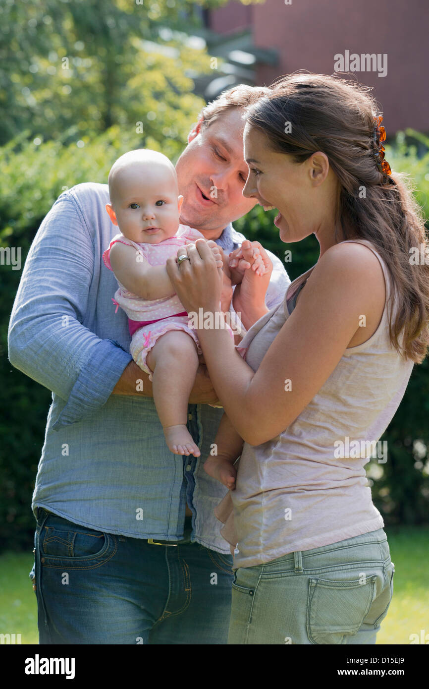 Netherlands, Mijnsheerenland, Family with baby daughter (6-11 months ...