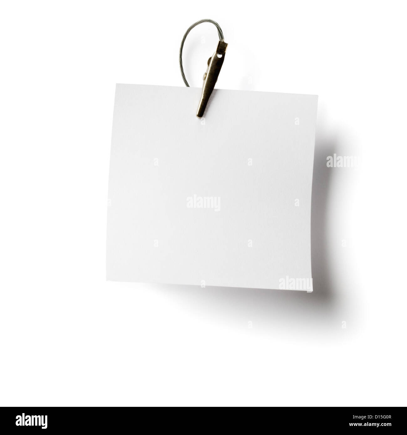 White notepad with crocodile clip on white, clipping path included ...