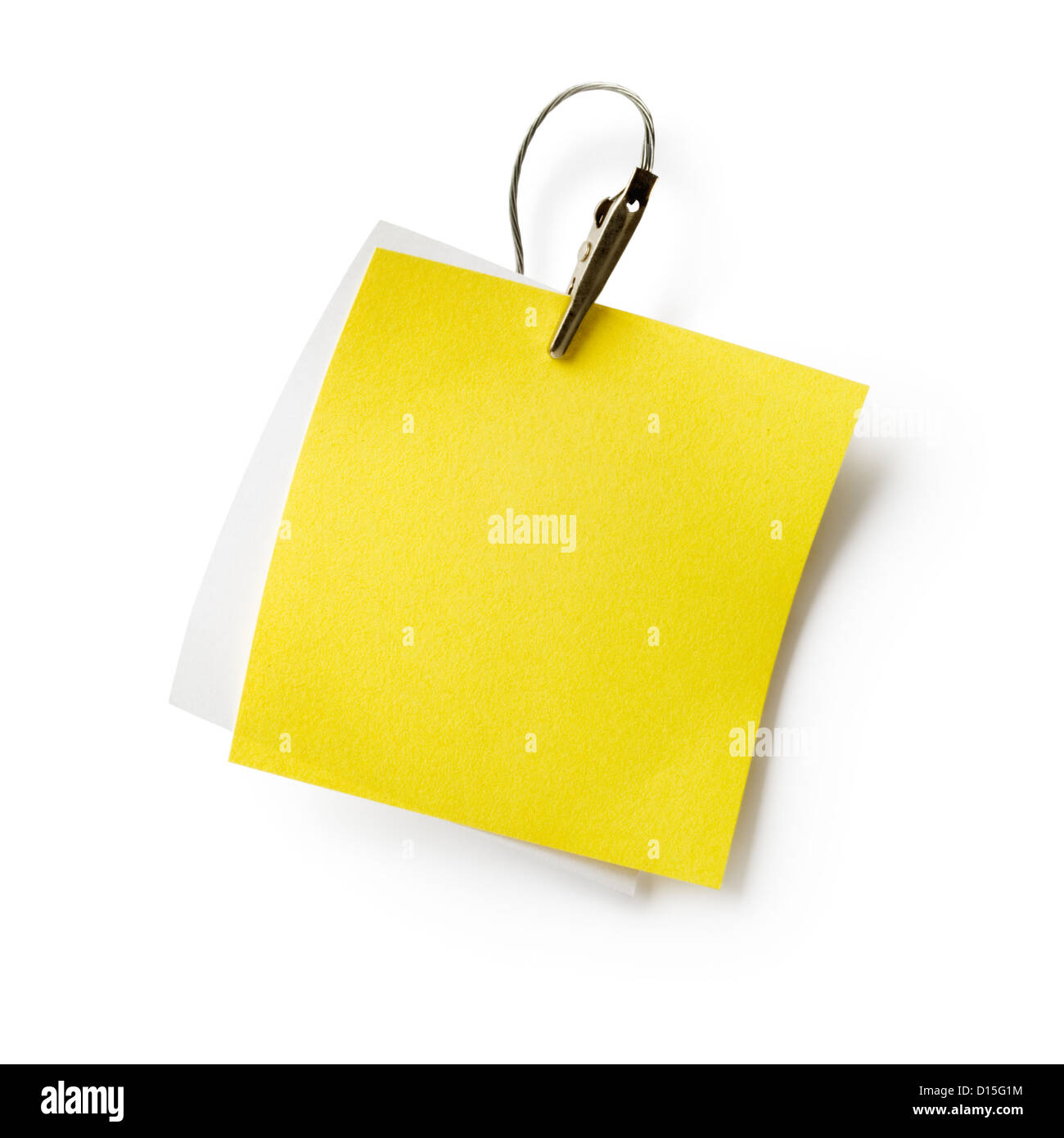 White and yellow notepads with crocodile clip on white, clipping path ...