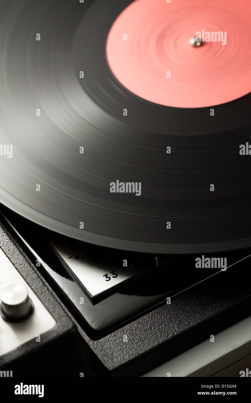 Vintage record player with spinning vinyl Stock Photo - Alamy