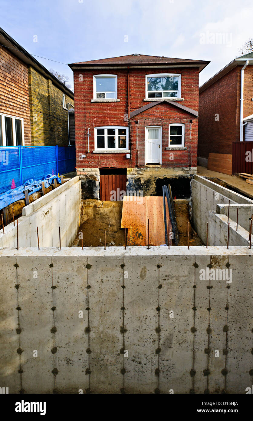 Building addition to residential house with new foundation Stock Photo ...