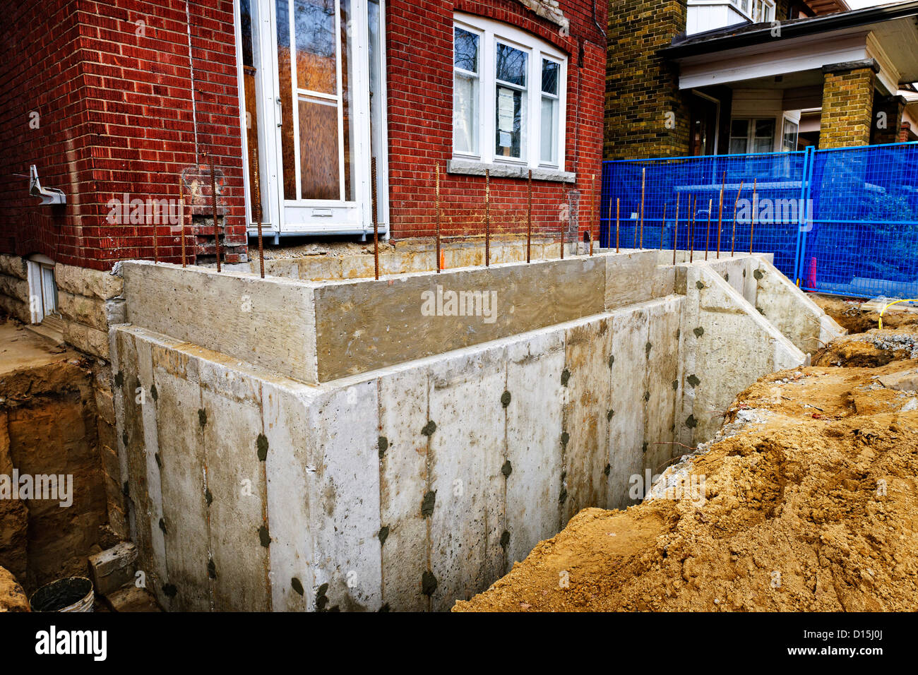 Building addition to residential house with new foundation Stock Photo ...