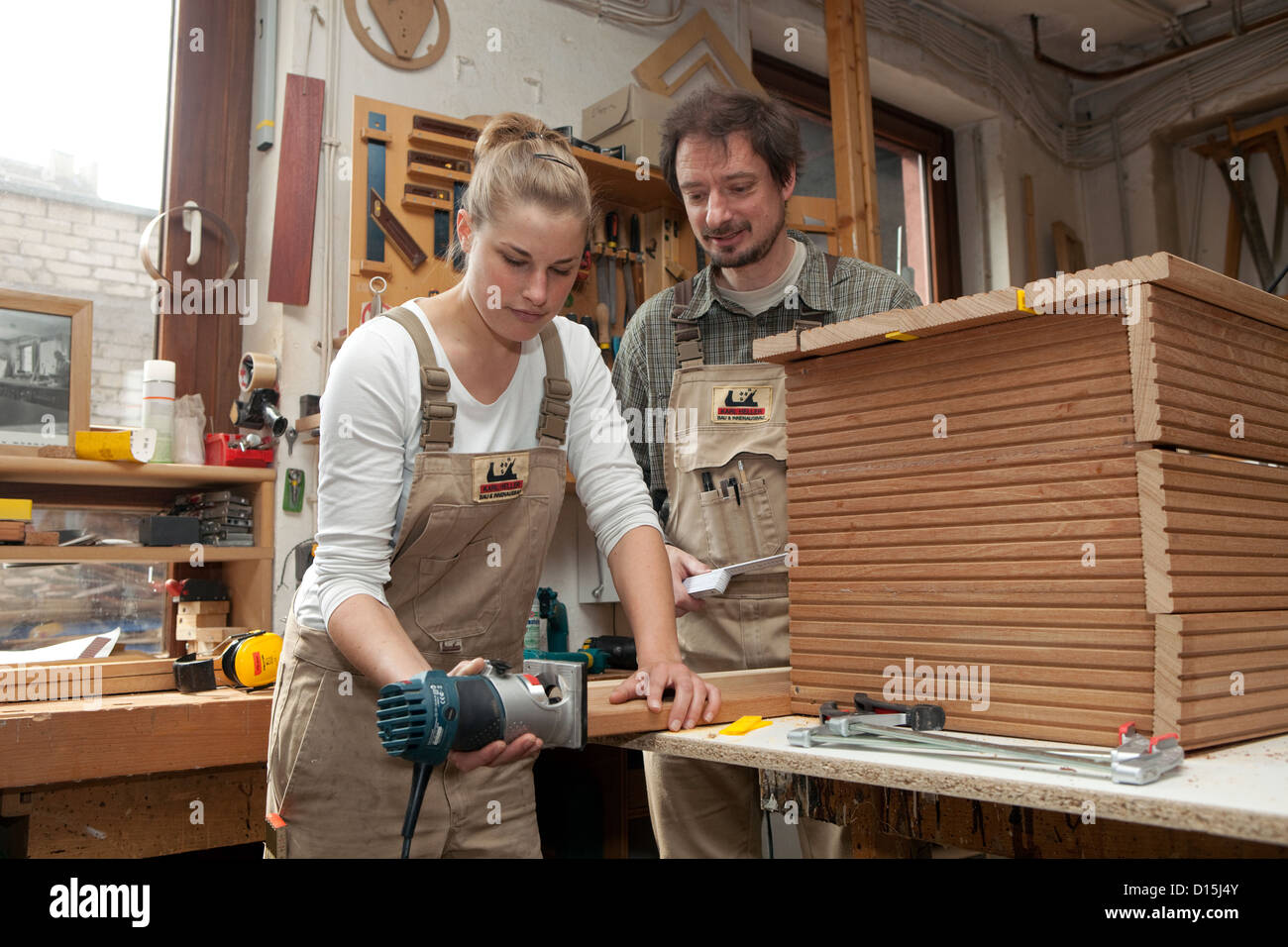Duesseldorf, Germany, master and apprentice in carpentry Stock Photo ...