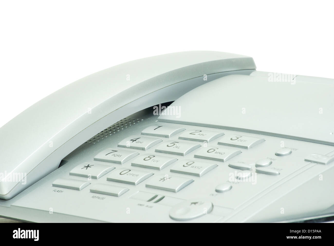grey office telephone on a white background Stock Photo - Alamy
