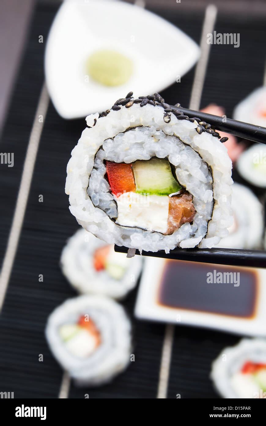 Sushi and sticks. Closeup composition Stock Photo - Alamy