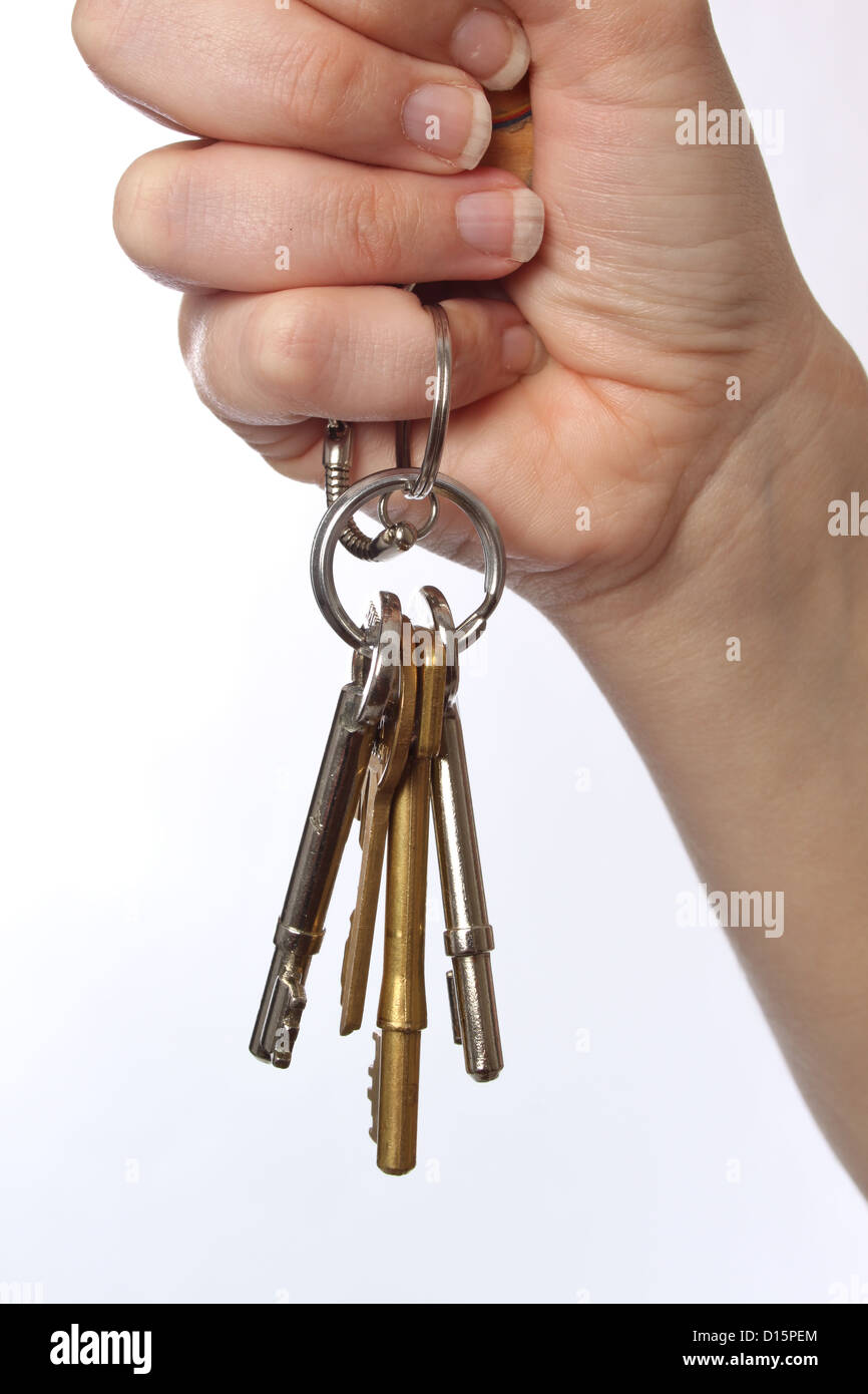 close up of a hand holding a bunch of keys Stock Photo - Alamy