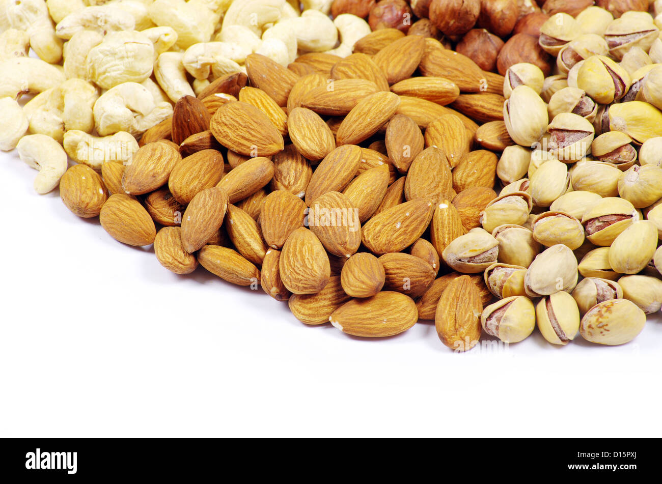 Assorted mixed nuts on white background Stock Photo - Alamy